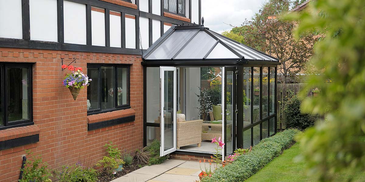 Black UPVC Conservatory & French Doors by 5 Star Conservatories ...